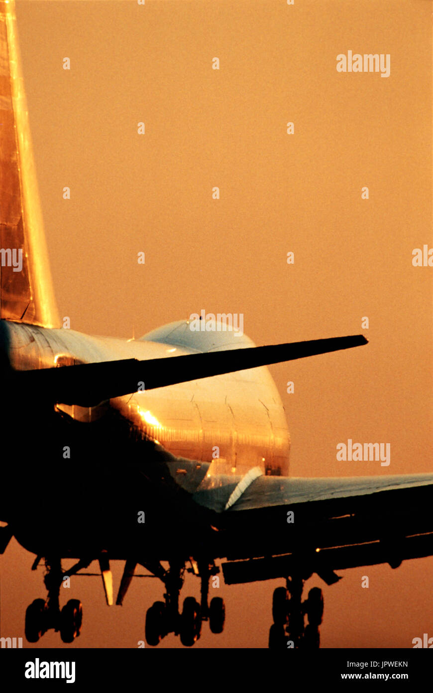 Boeing 747 on final-approach at dusk Stock Photo - Alamy