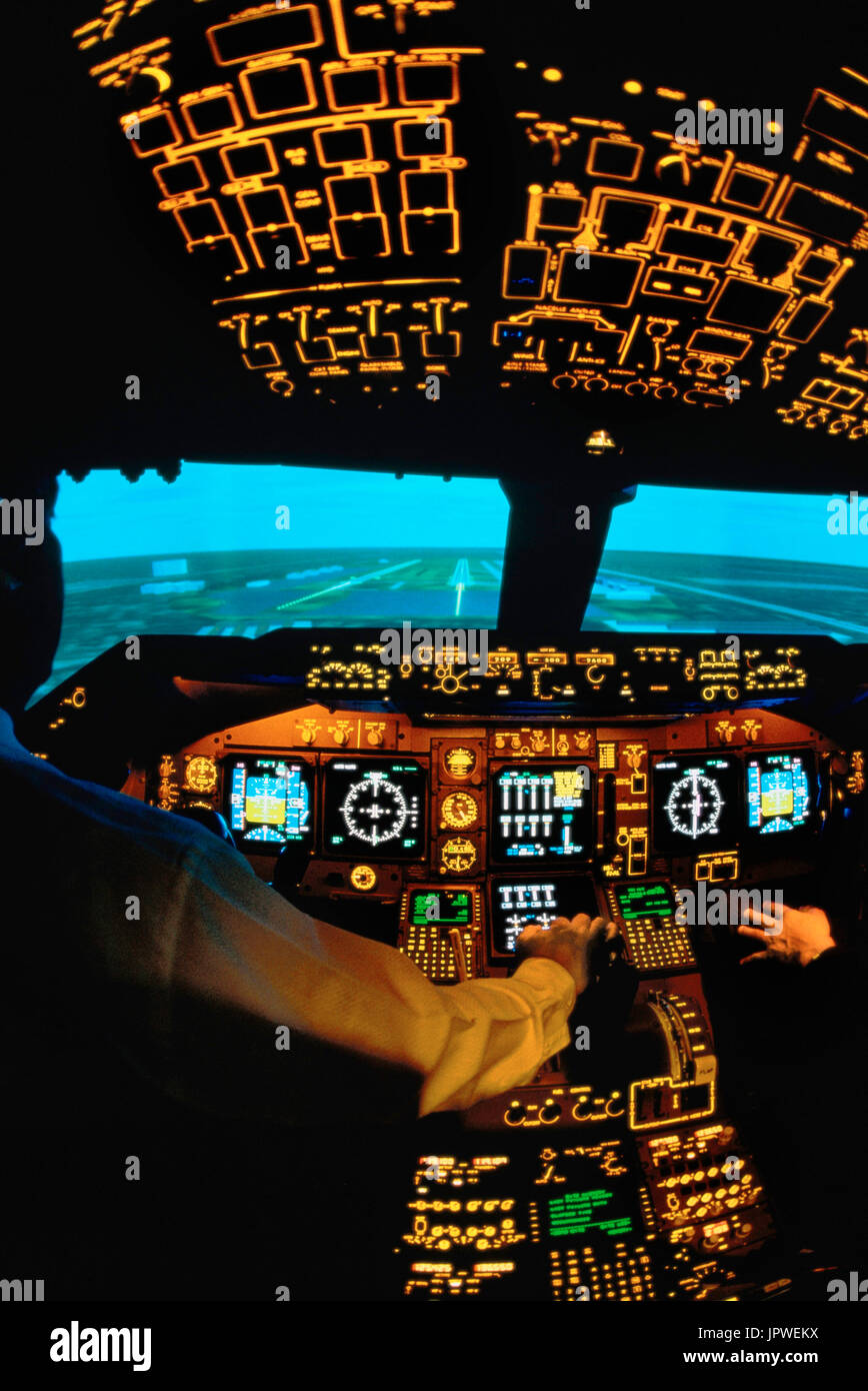 pilots in a Boeing 747-400 aircraft cockpit simulator Stock Photo - Alamy