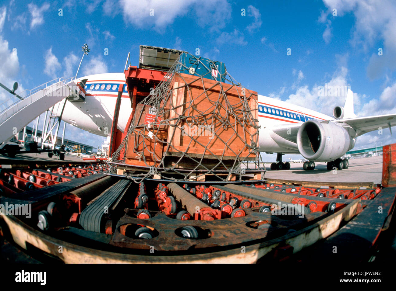 cargo being loaded by a low-loader onto a McDonnell Douglas DC-10 Stock ...