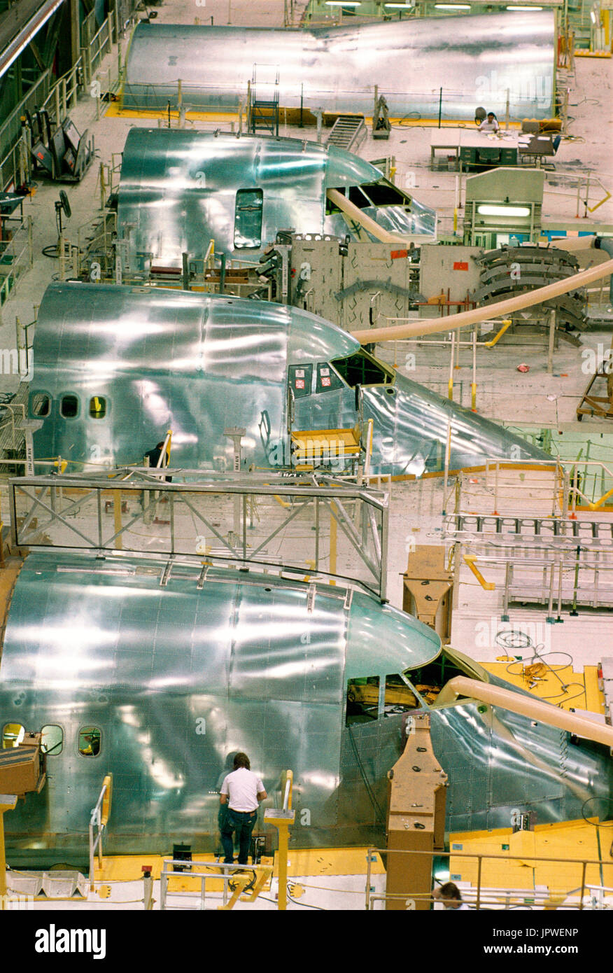 engineer working on section 41 front cockpit of Boeing 747-400 with ...