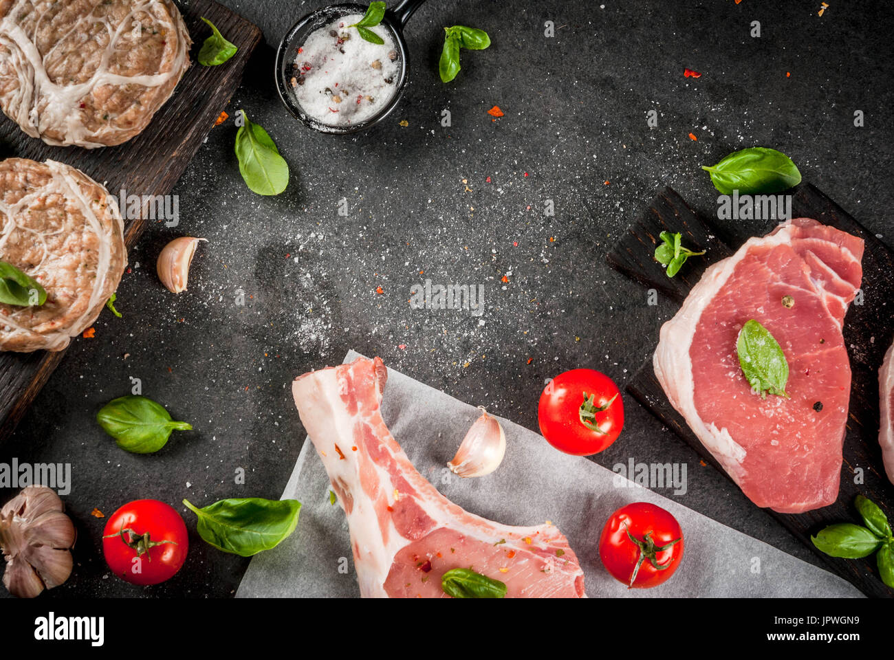 Raw organic meat. Selection of several types of red meat: pork cutlet ...