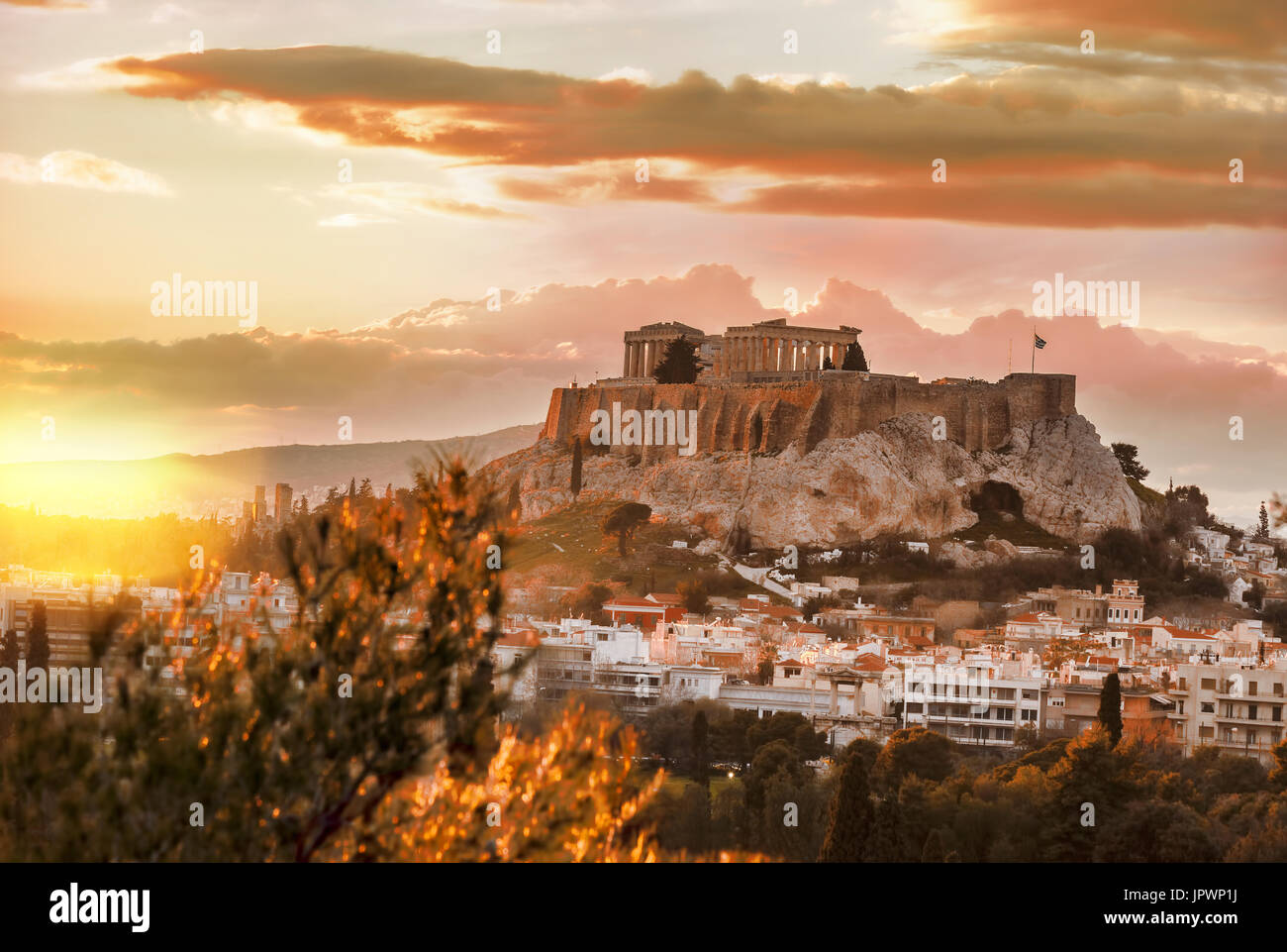 Acropolis with Parthenon temple against sunset in Athens, Greece Stock Photo - Alamy
