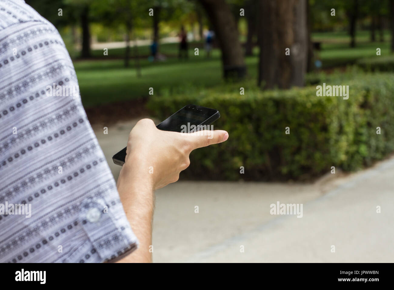 Mobile talking man anonymous young hi-res stock photography and images ...