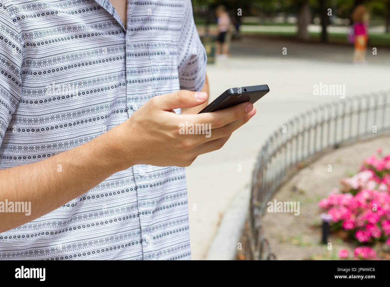 Mobile talking man anonymous young hi-res stock photography and images ...
