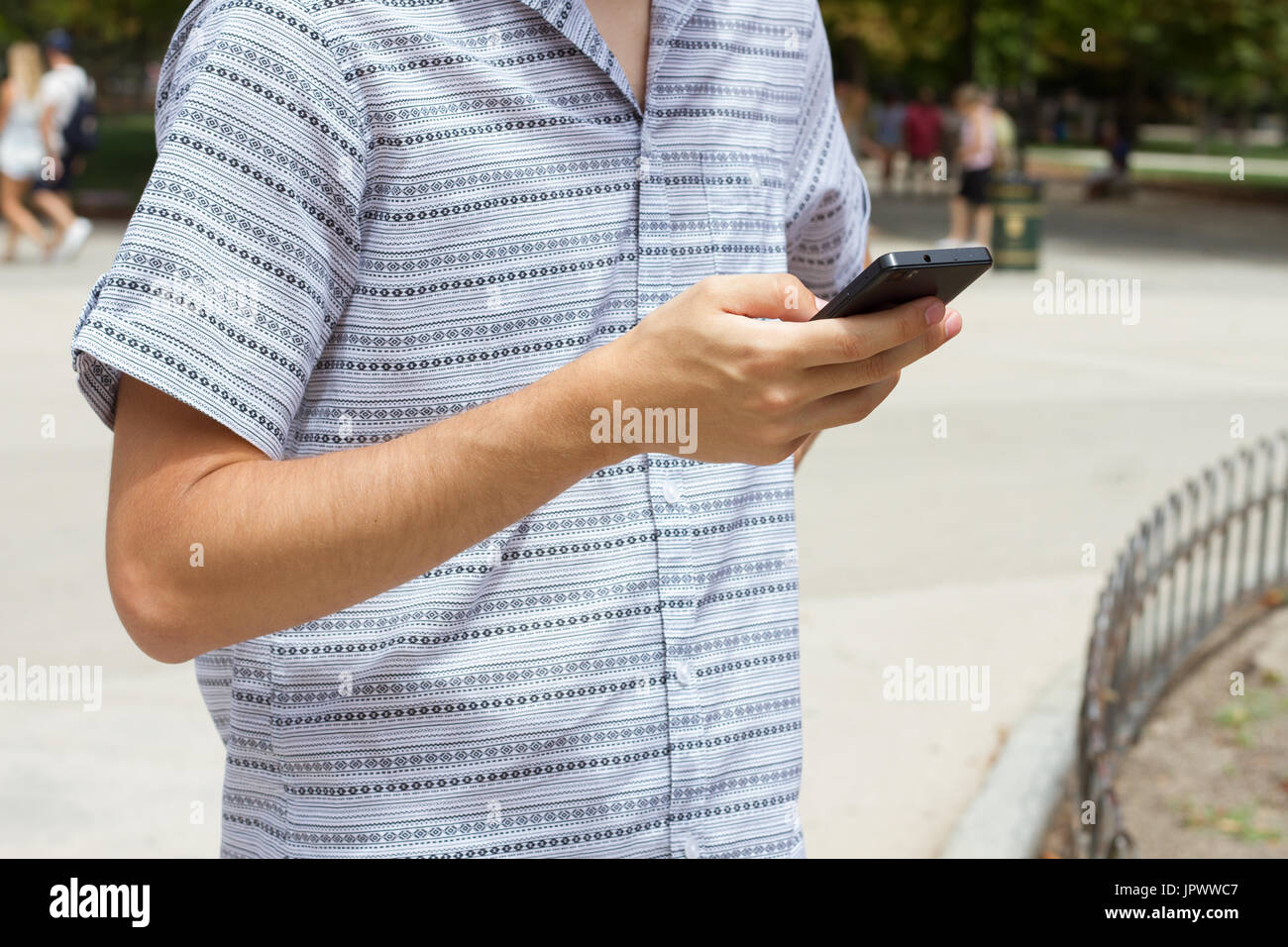 Mobile talking man anonymous young hi-res stock photography and images ...