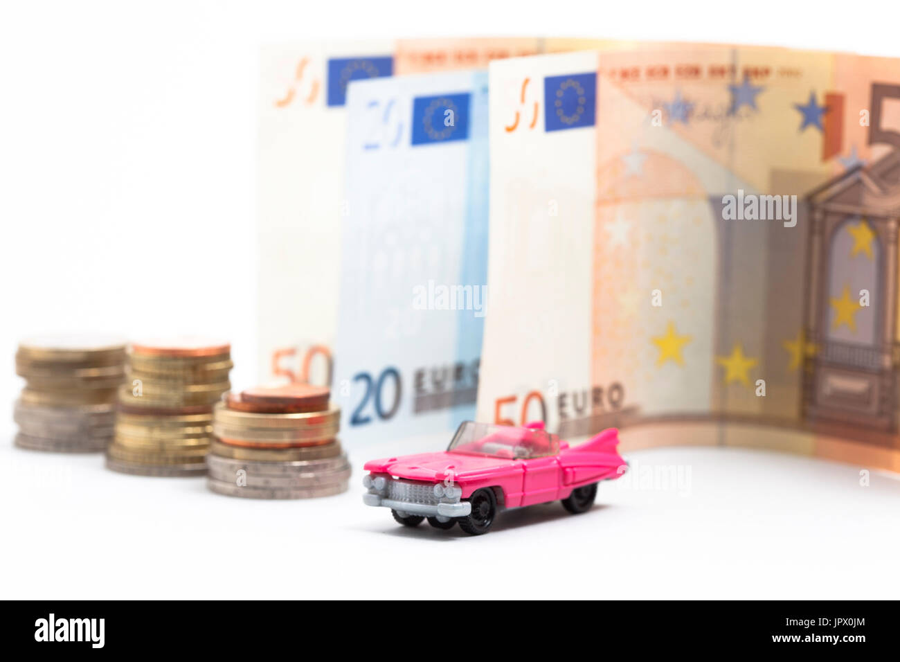 toy car and money Stock Photo - Alamy