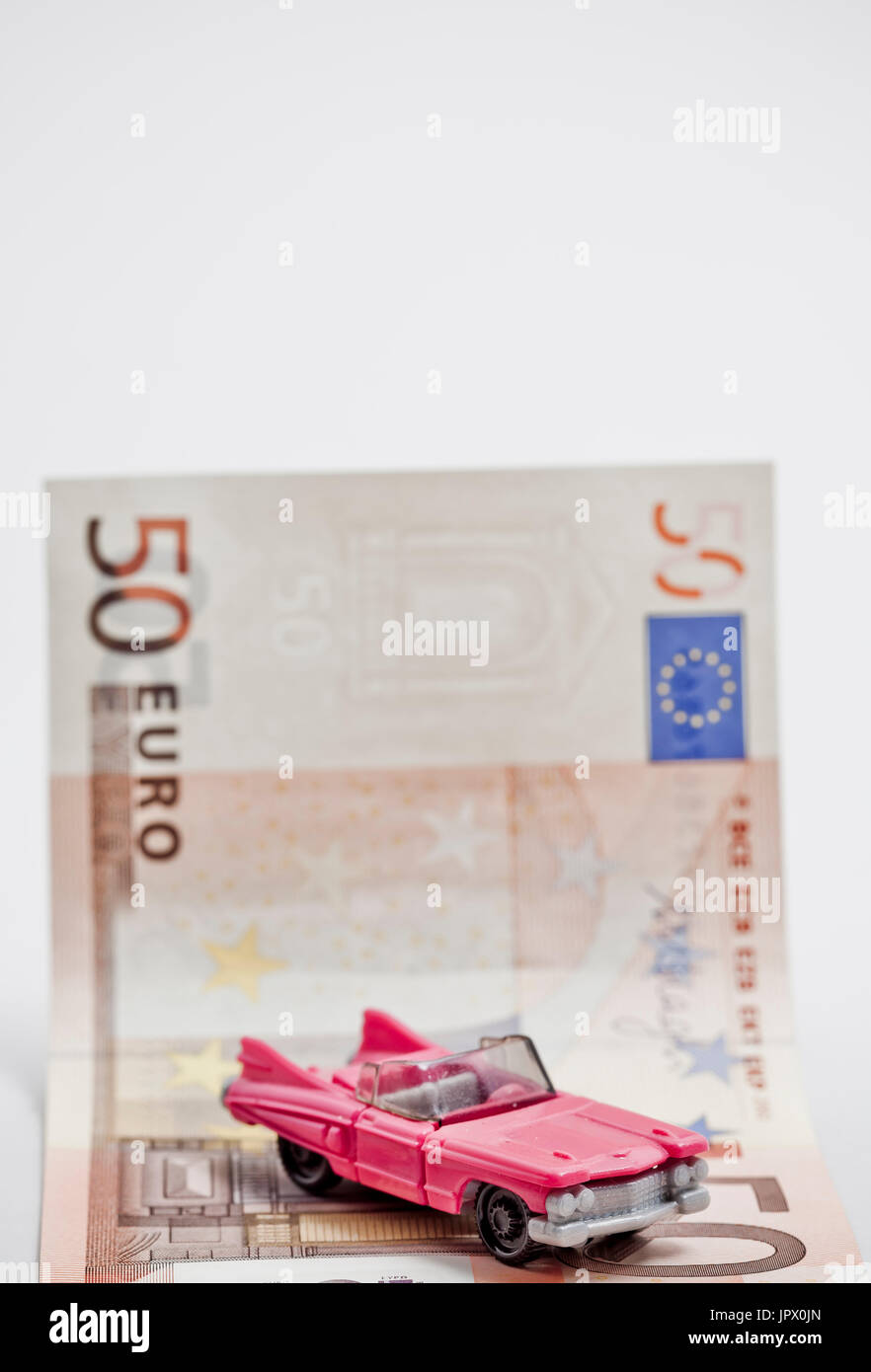 toy car and money Stock Photo - Alamy