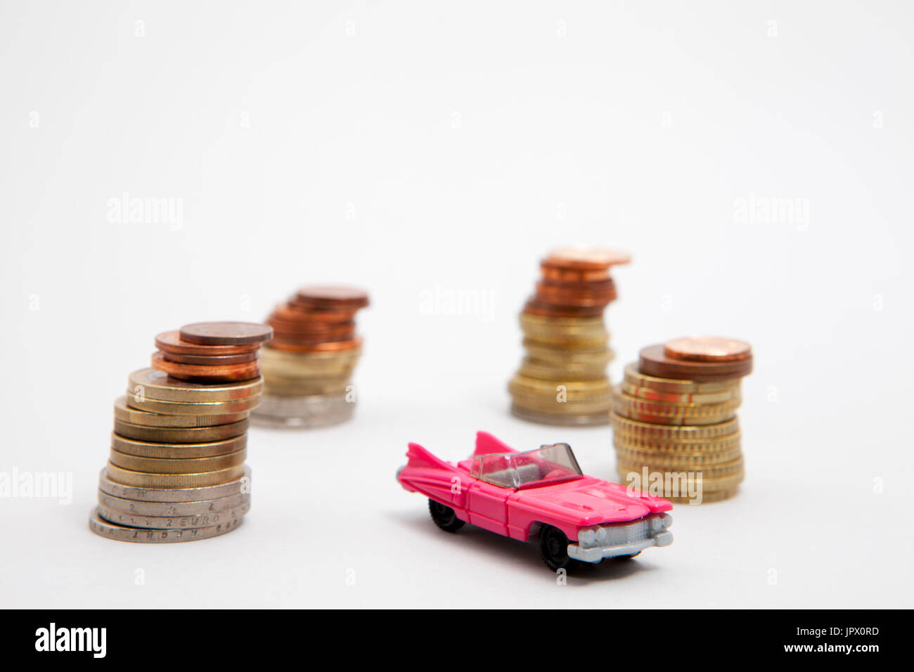 toy car and coins Stock Photo - Alamy