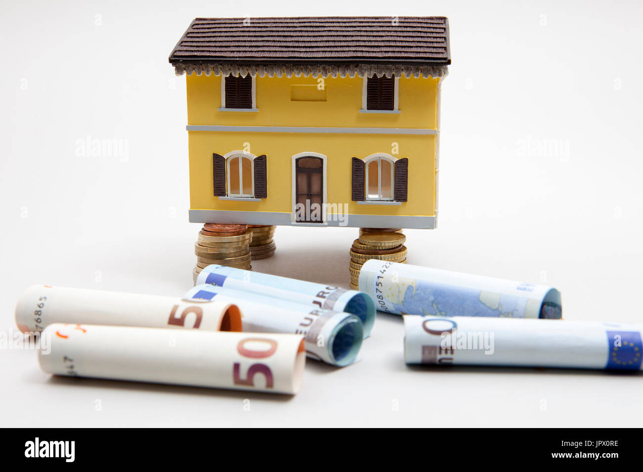 house and money Stock Photo - Alamy