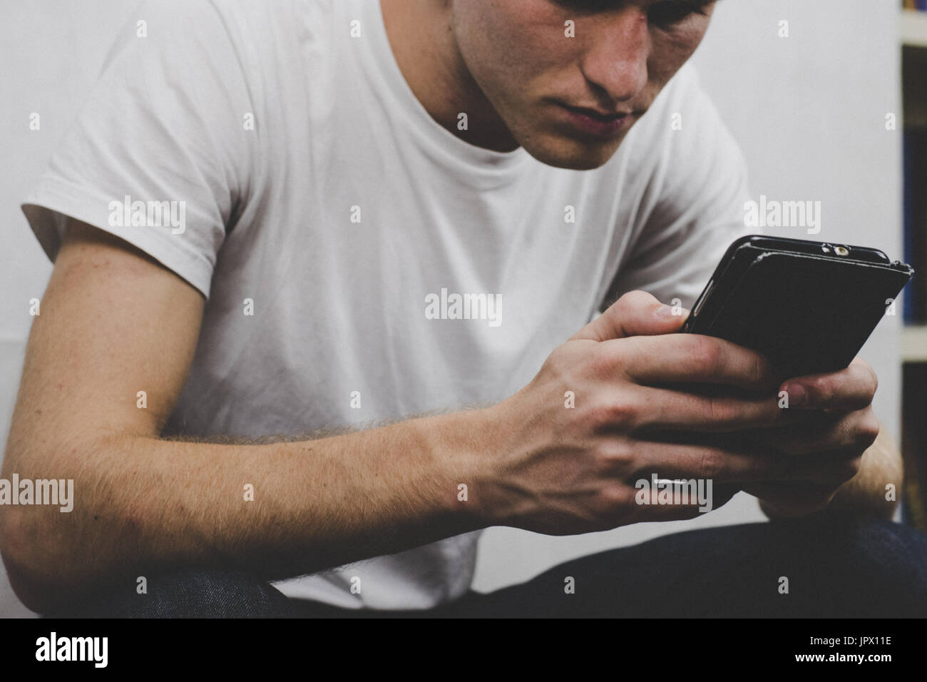 Man on his phone Stock Photo - Alamy