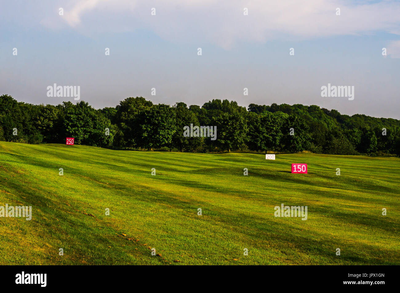 Golf course on a beautiful day, green grass, lush vegetation, golf ...