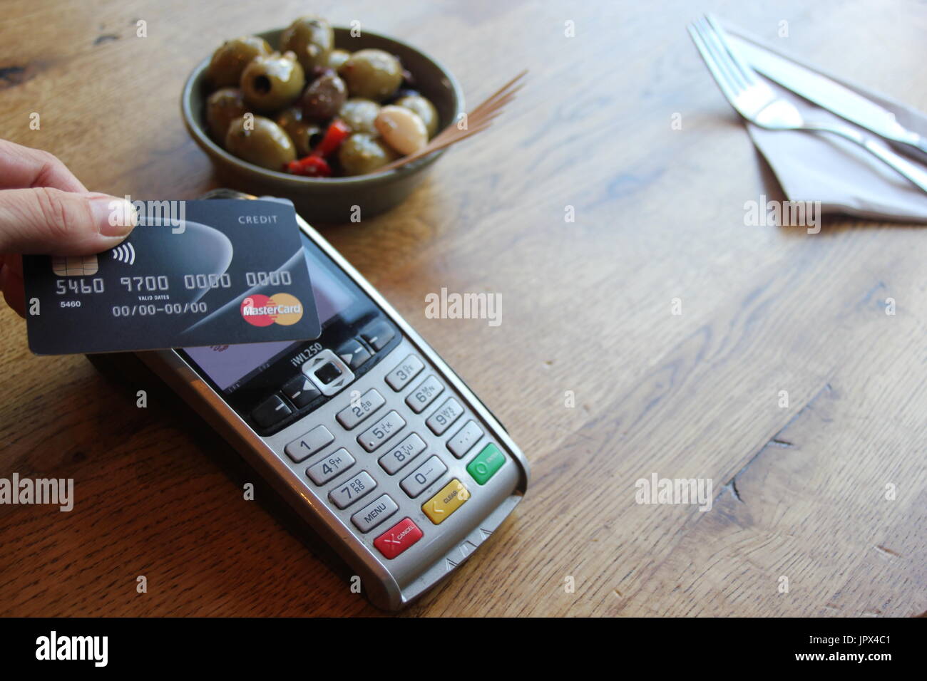 contactless payment card pdq background copy space with hand holding ...
