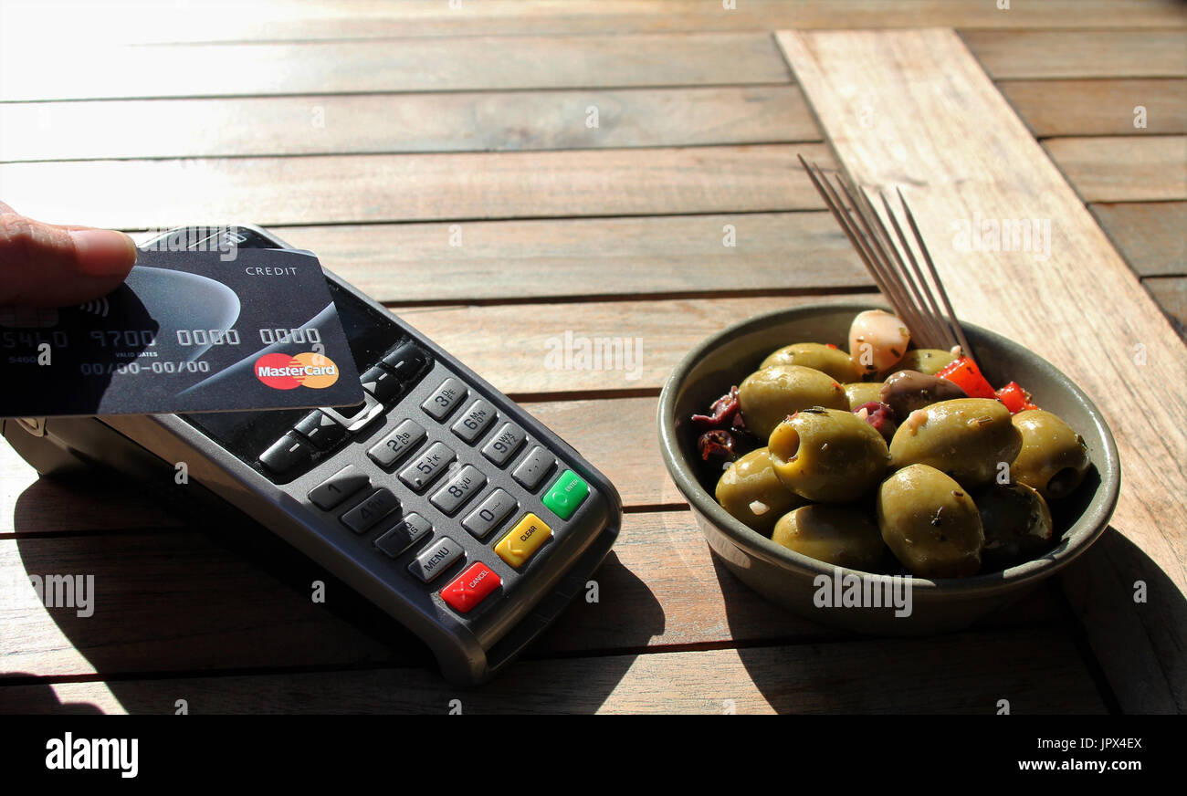 contactless payment card pdq background copy space with hand holding ...