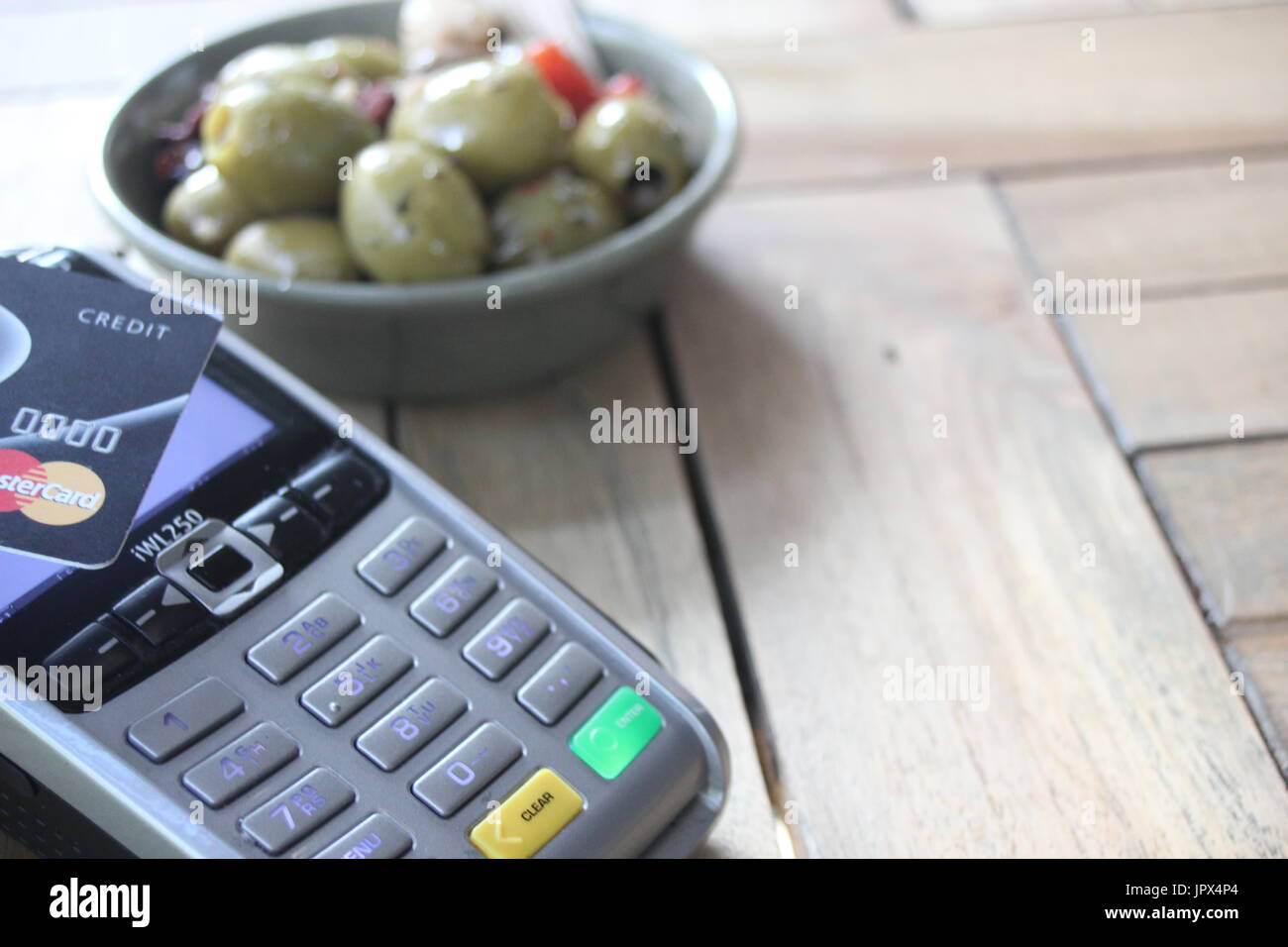 contactless payment card pdq background copy space with hand holding ...