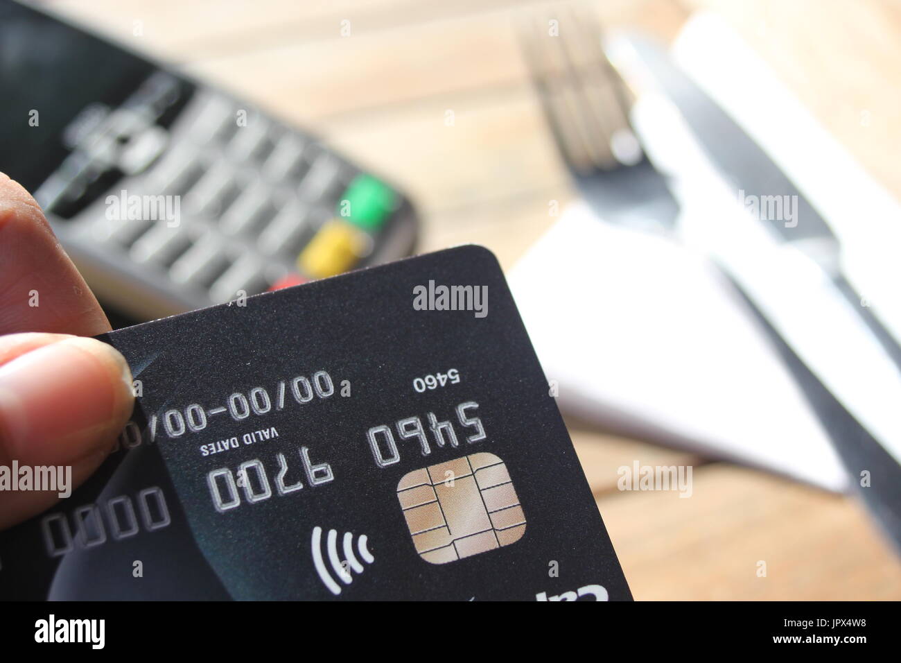 contactless payment card pdq background copy space with hand holding ...