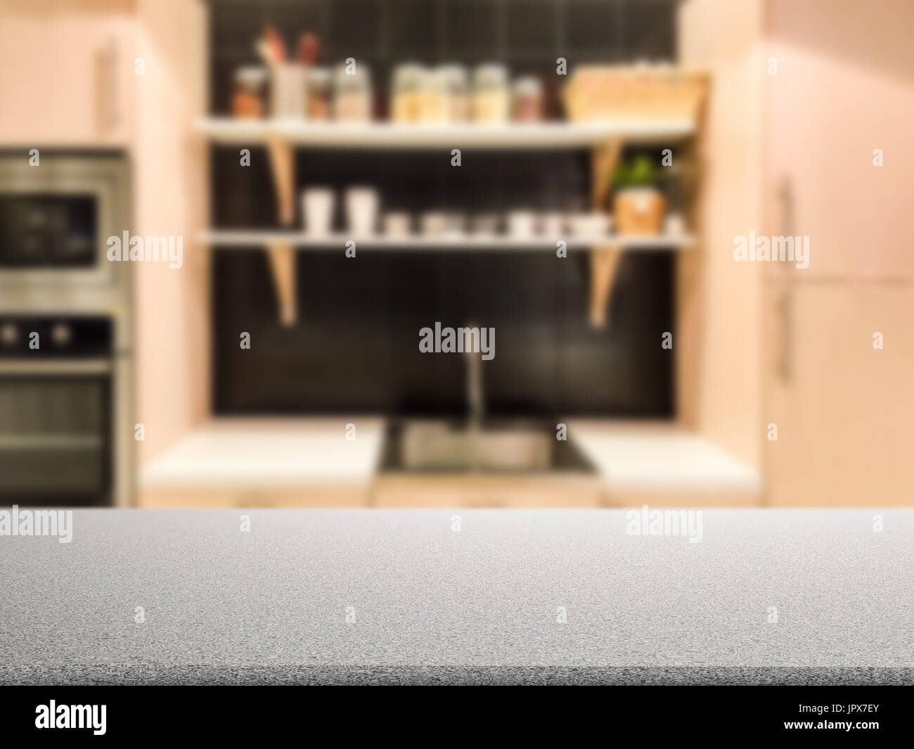 granite counter top with kitchen cabinet background Stock Photo - Alamy