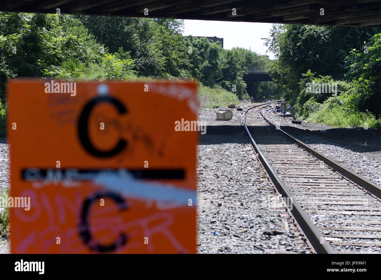 Single freight train track used by Conrail curves under North Mascher ...