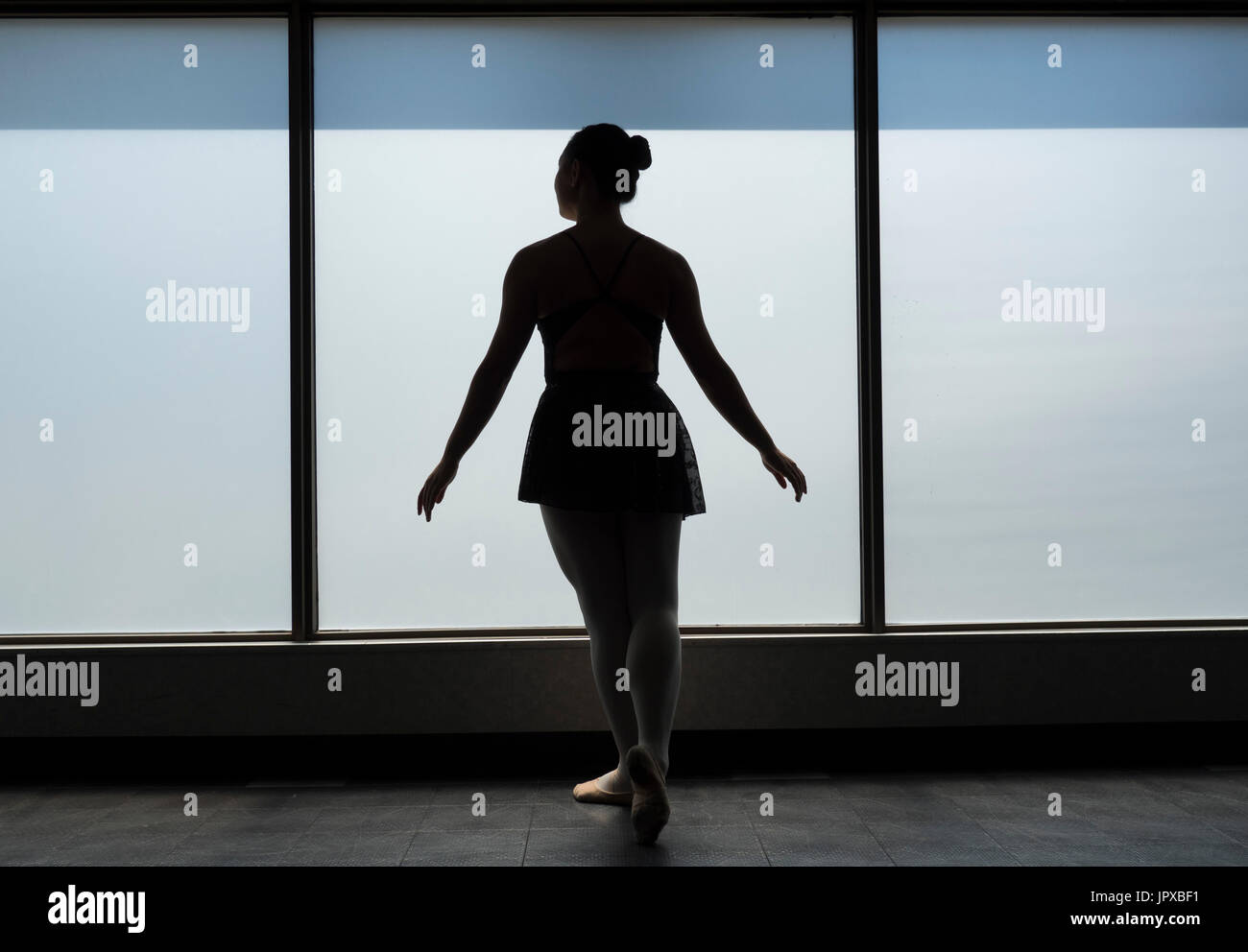 Classical Position ballet dancer silhouette Stock Photo - Alamy