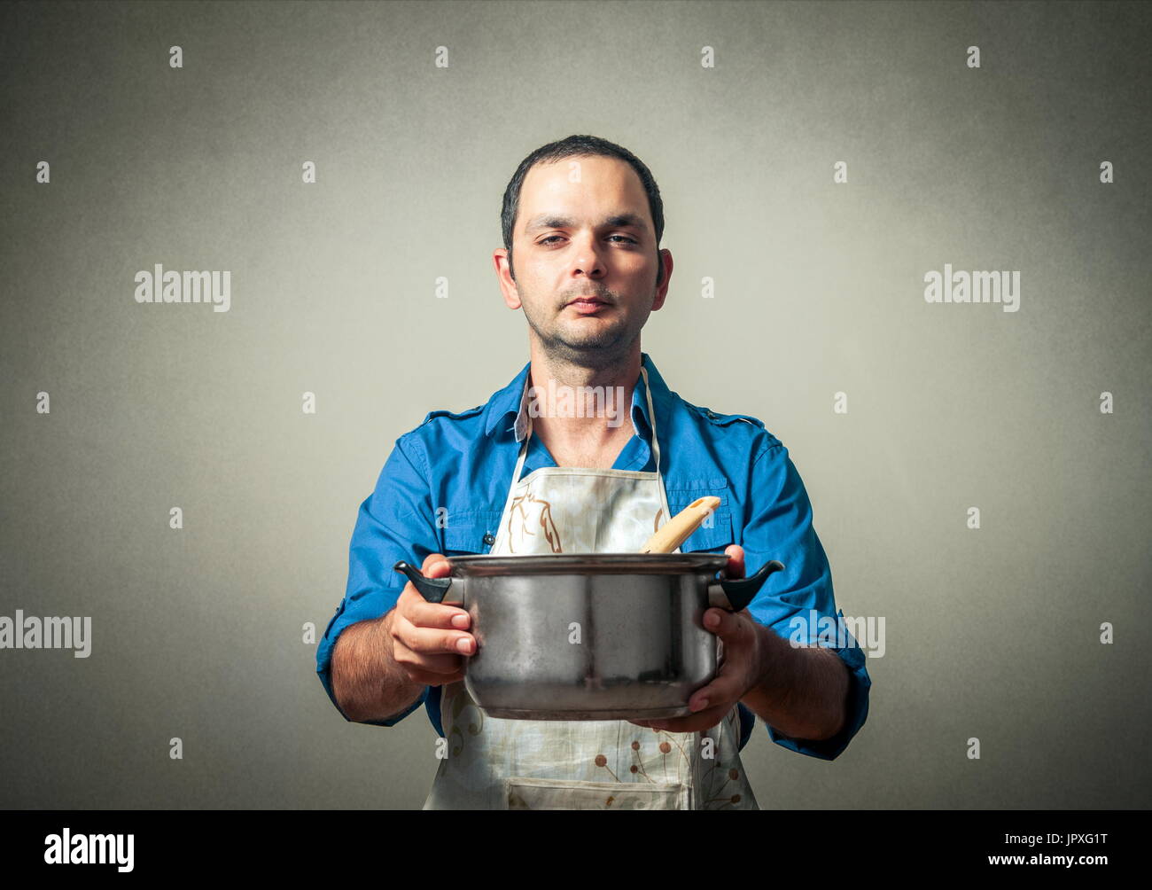 Man young cook cuisine saucepan hi-res stock photography and images - Alamy
