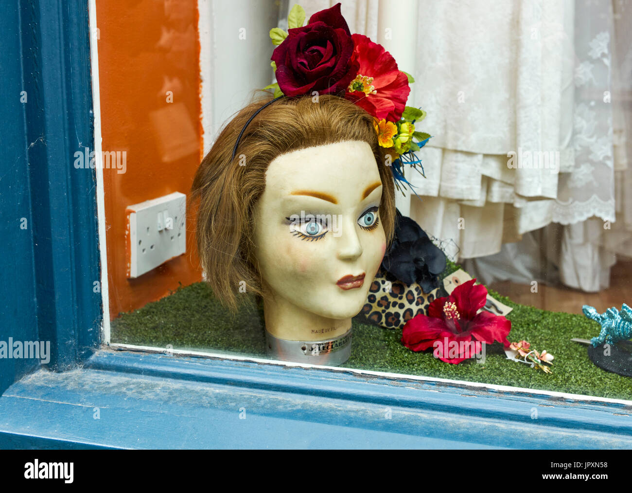 Shop window in Frome, Somerset with scary French mannekin head Stock ...