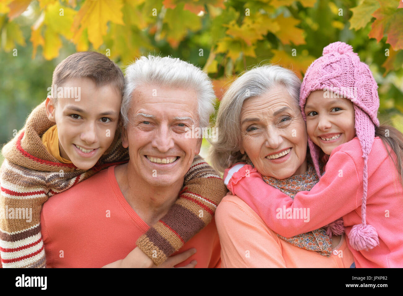 Family portrait of happy grandparents and grandchildren Stock Photo - Alamy
