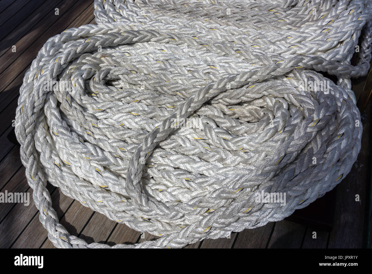 Rope on a sailing boat laying on the wooden plank ground Stock Photo ...