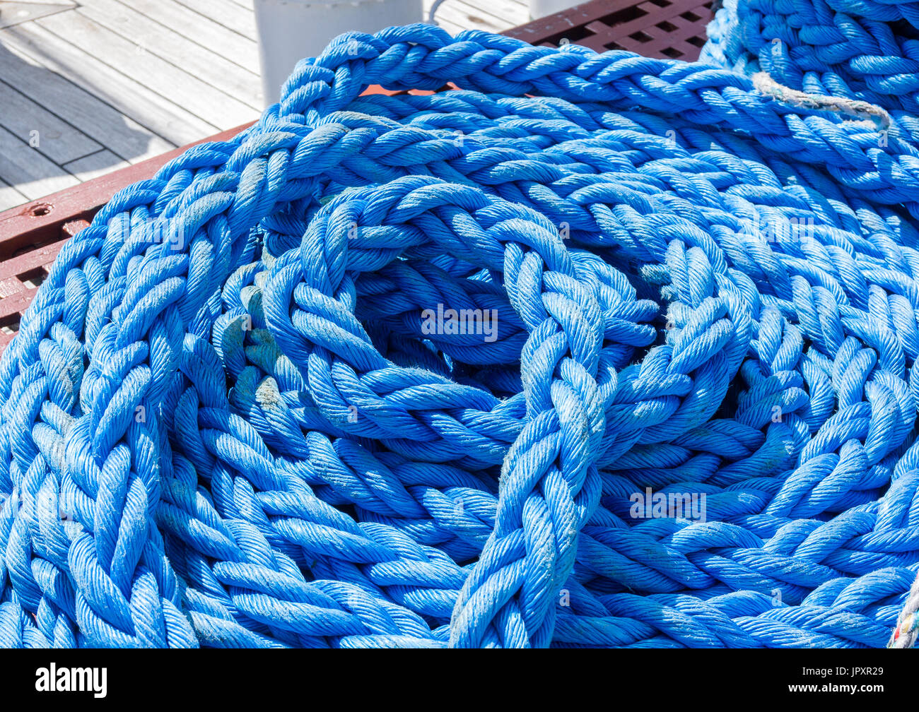 Rope on a sailing boat laying on the wooden plank ground Stock Photo ...