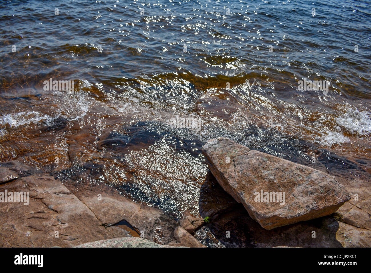 large rocks in water Stock Photo - Alamy