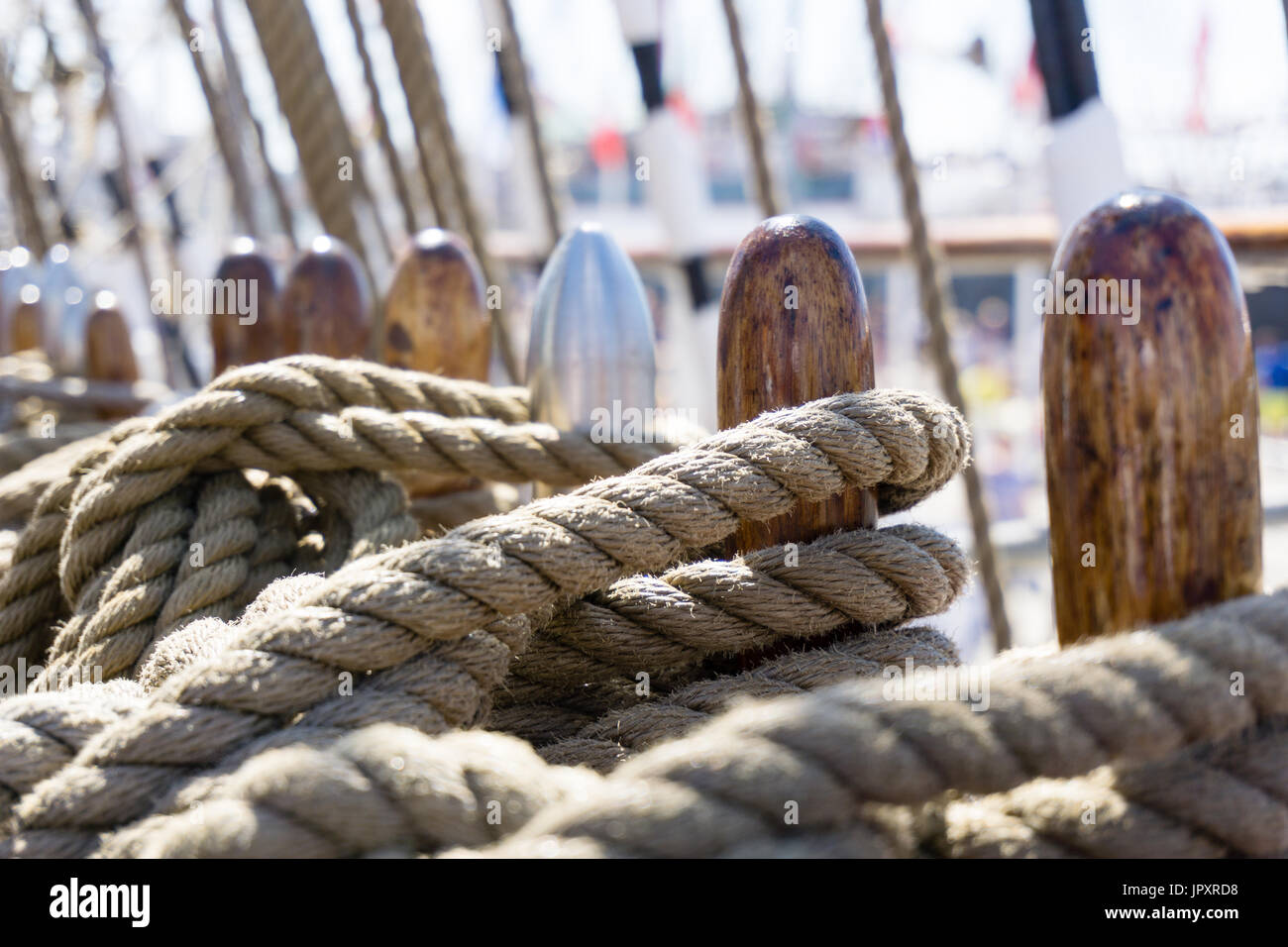 Old wooden tackle for rope on the sailboat Stock Photo - Alamy