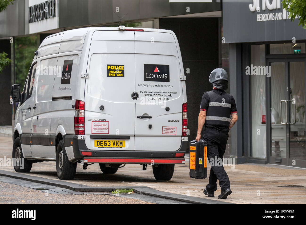 Security guard delivering cash hi-res stock photography and images - Alamy