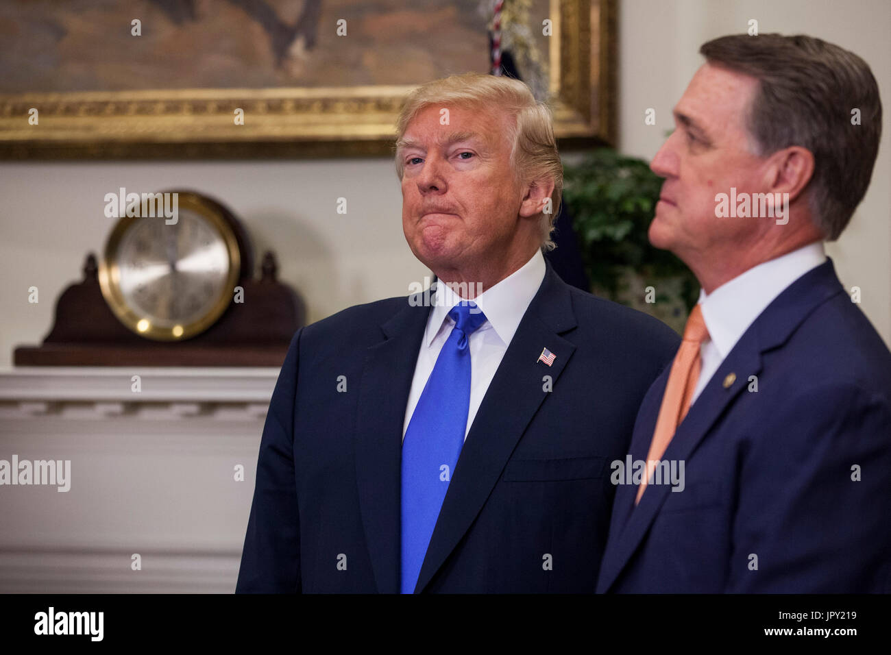 United States President Donald J. Trump and US Senator David Perdue ...