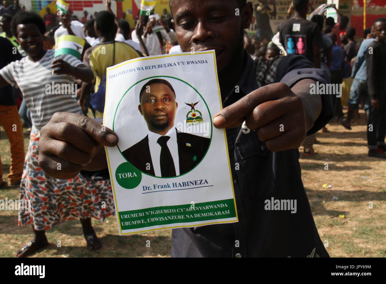 Kigali, Rwanda. 2nd Aug, 2017. A man holds a poster of Rwanda's ...