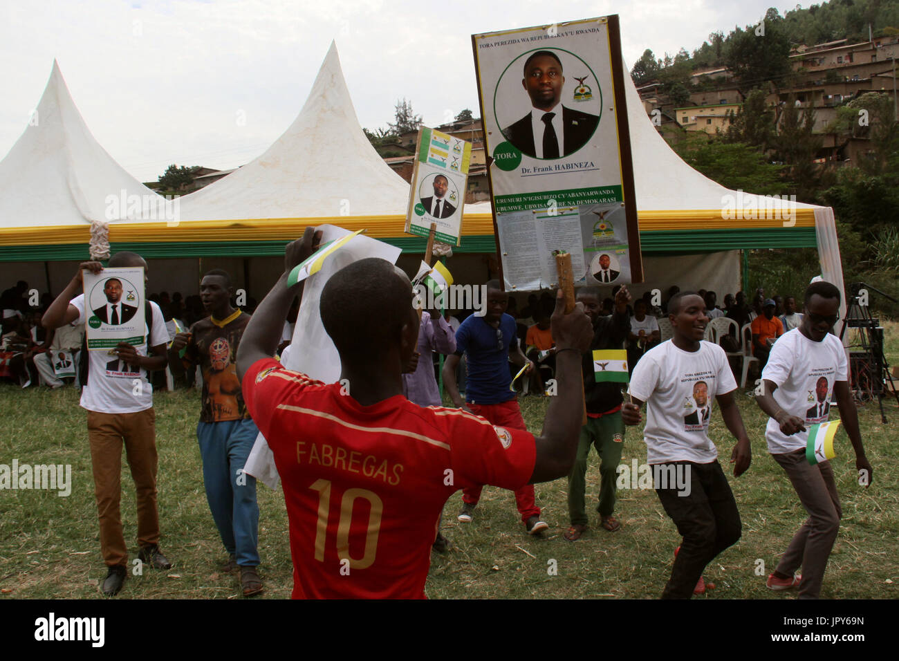Kigali, Rwanda. 2nd Aug, 2017. People hold posters of Rwanda's ...