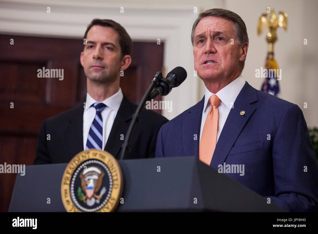 United States Senator David Perdue (Republican of Georgia), right ...