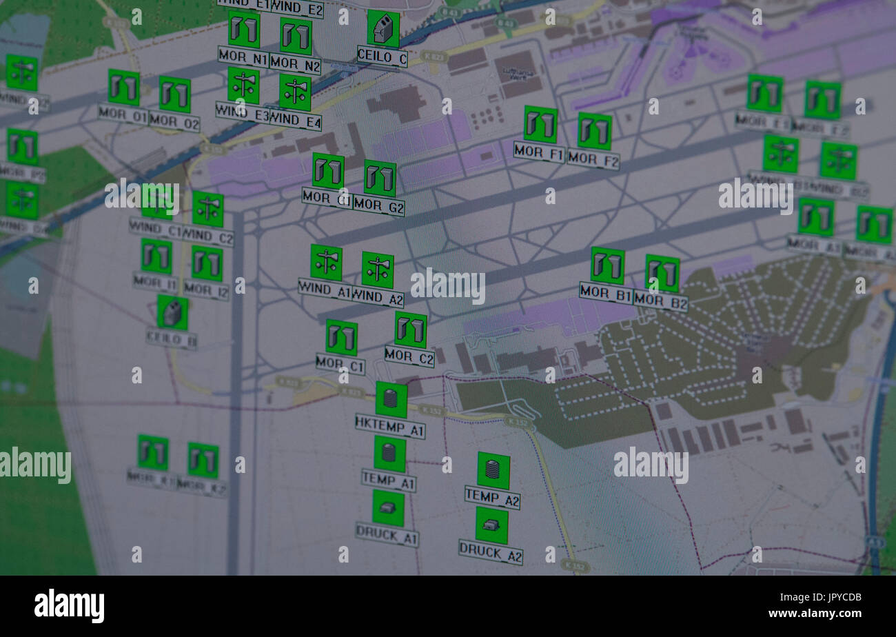 Green pictograms on a computer screen mark the location of weather ...