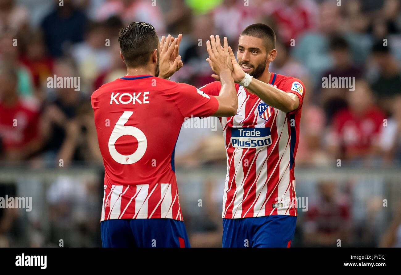 Munich, Germany. 1st Aug, 2017. Madrid's Yannick Carrasco (R ...