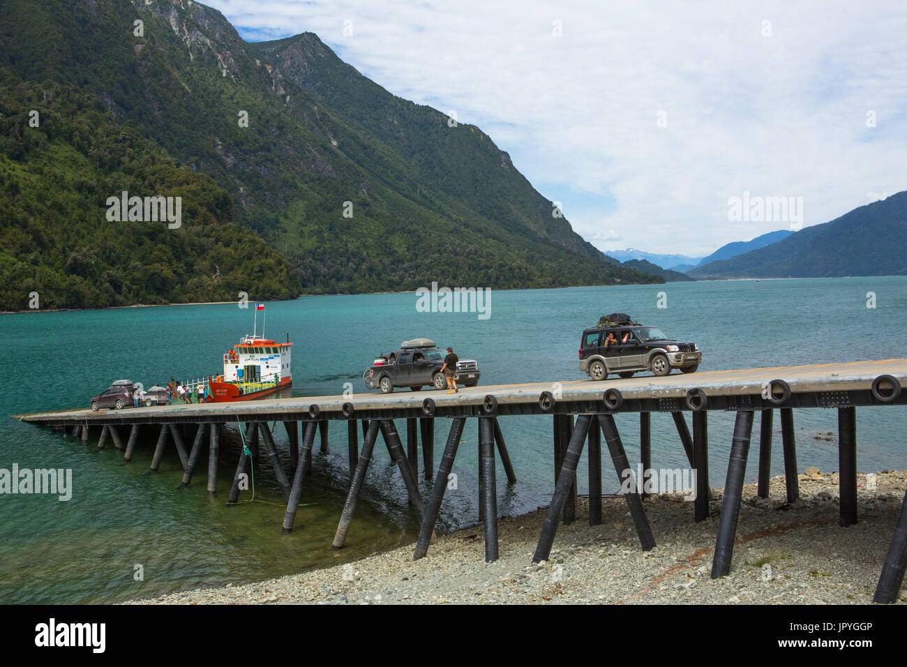 Cars exiting a ferry - Lake Tagua Tagua Chile Stock Photo - Alamy