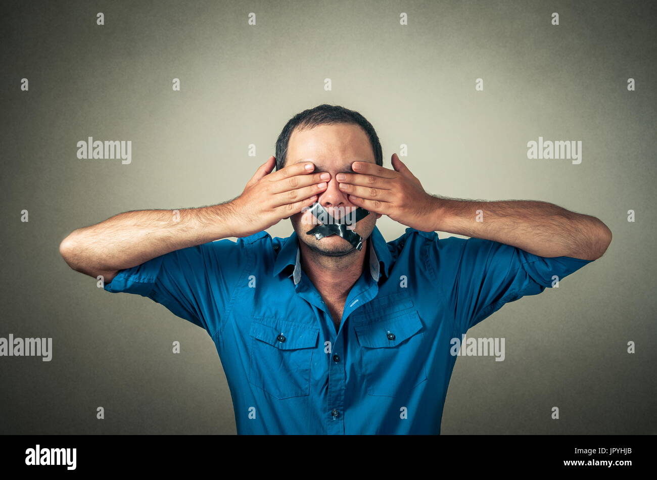 portrait of man with the taped mouth Stock Photo - Alamy
