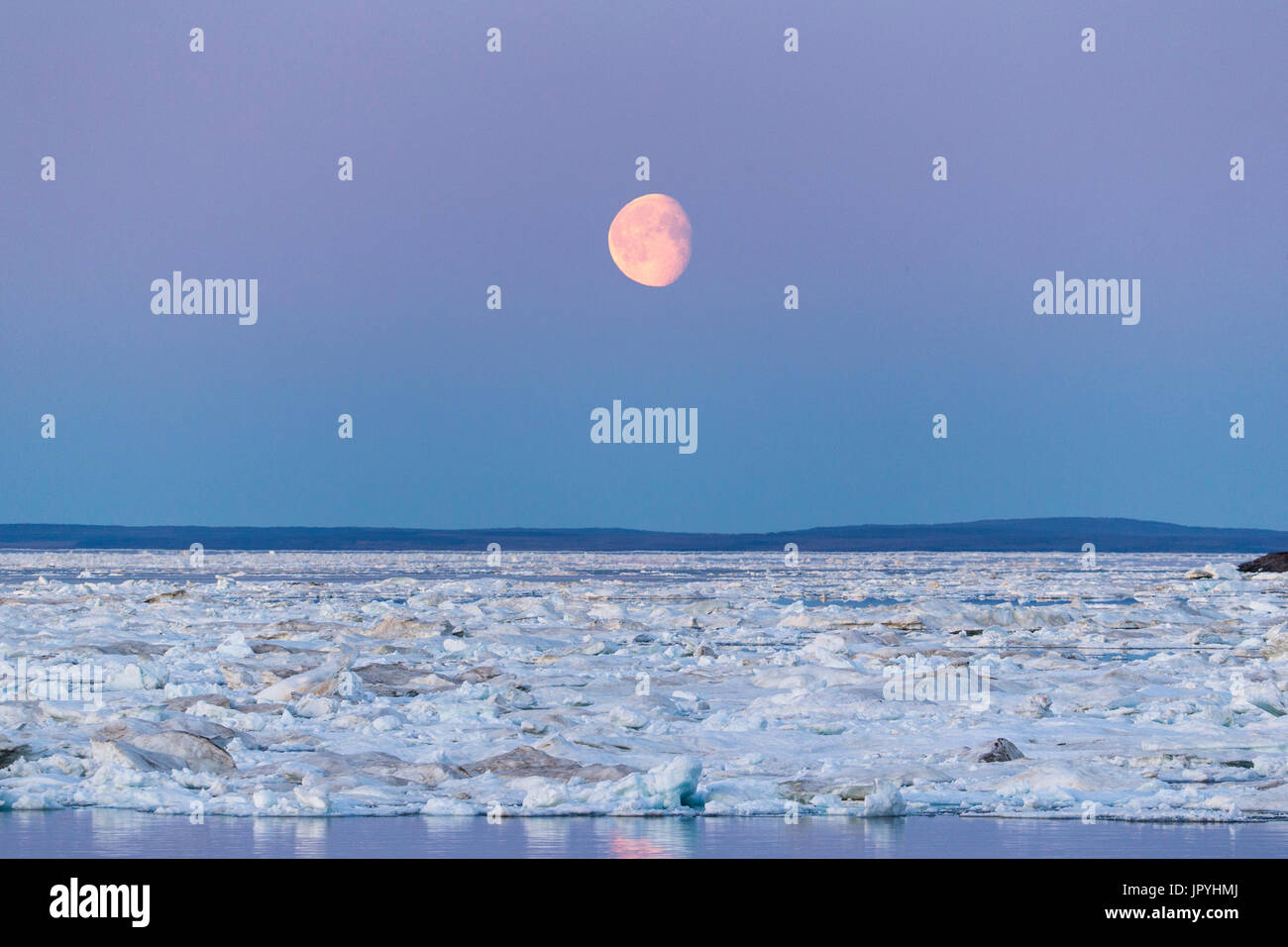 Full Moon and Melting Sea Ice - Hudson Bay Canada Stock Photo - Alamy