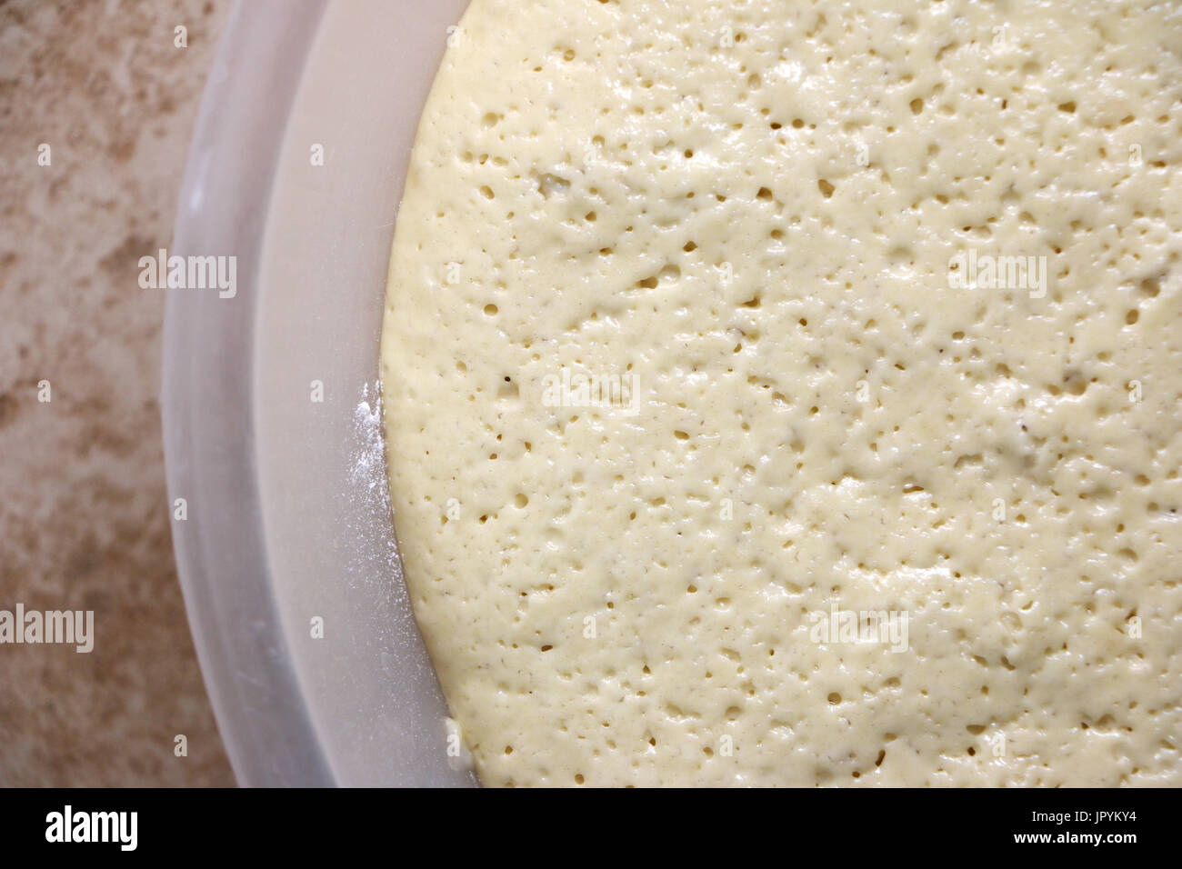 Yeast dough rising hi-res stock photography and images - Alamy