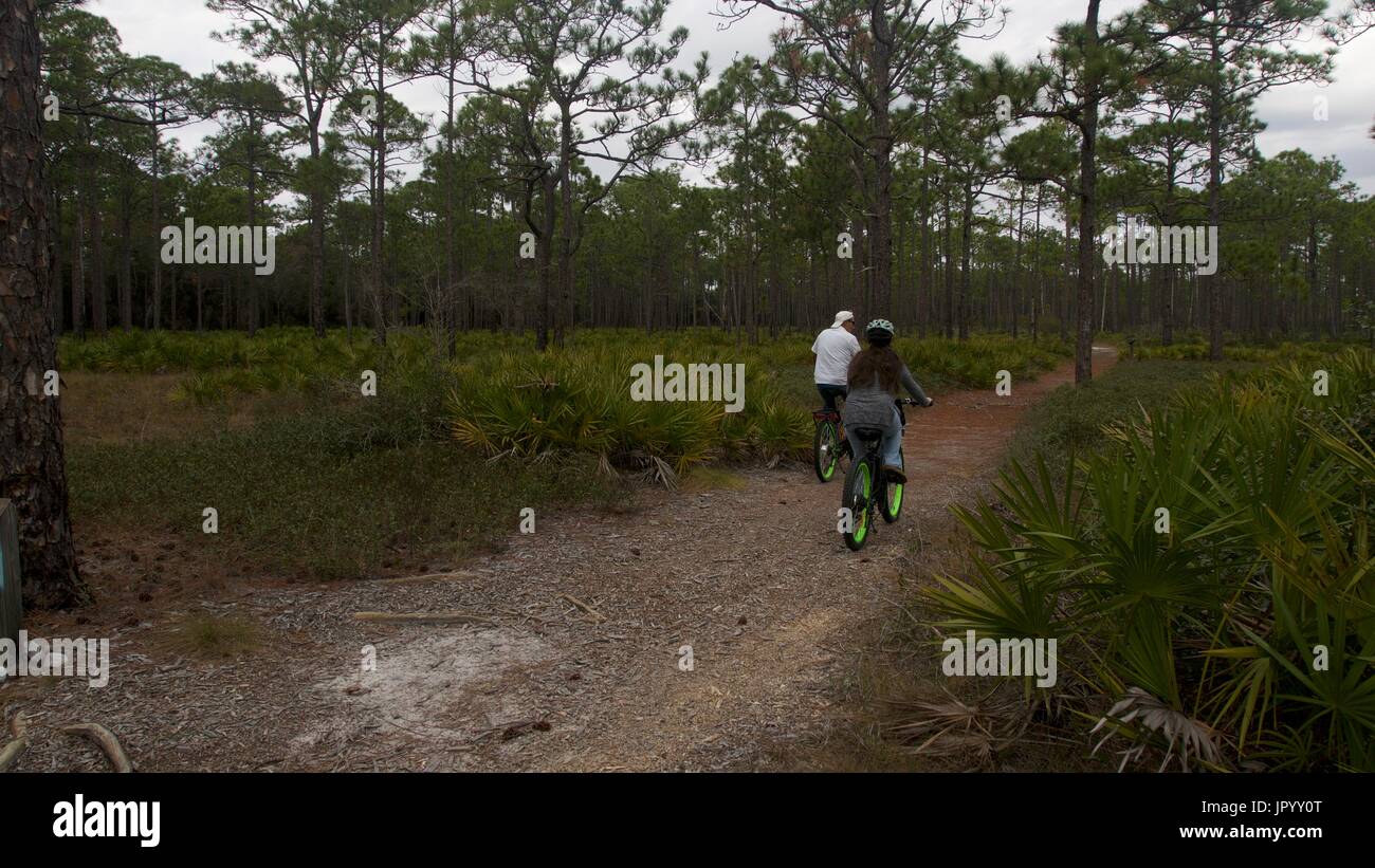 Riding electric bikes hi-res stock photography and images - Alamy