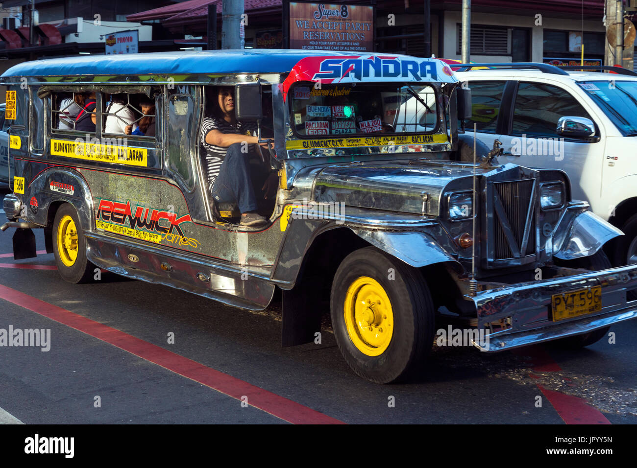 Jeepney and passengers, Manila, Philippines Stock Photo - Alamy