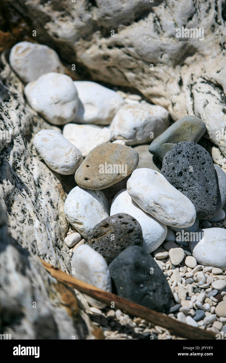 Rounded Stones on the beach Stock Photo - Alamy