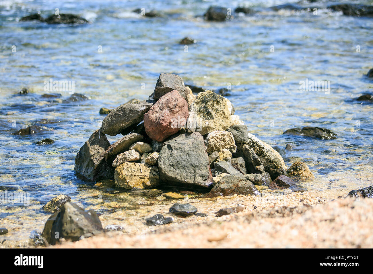 Rounded Stones on the beach Stock Photo - Alamy