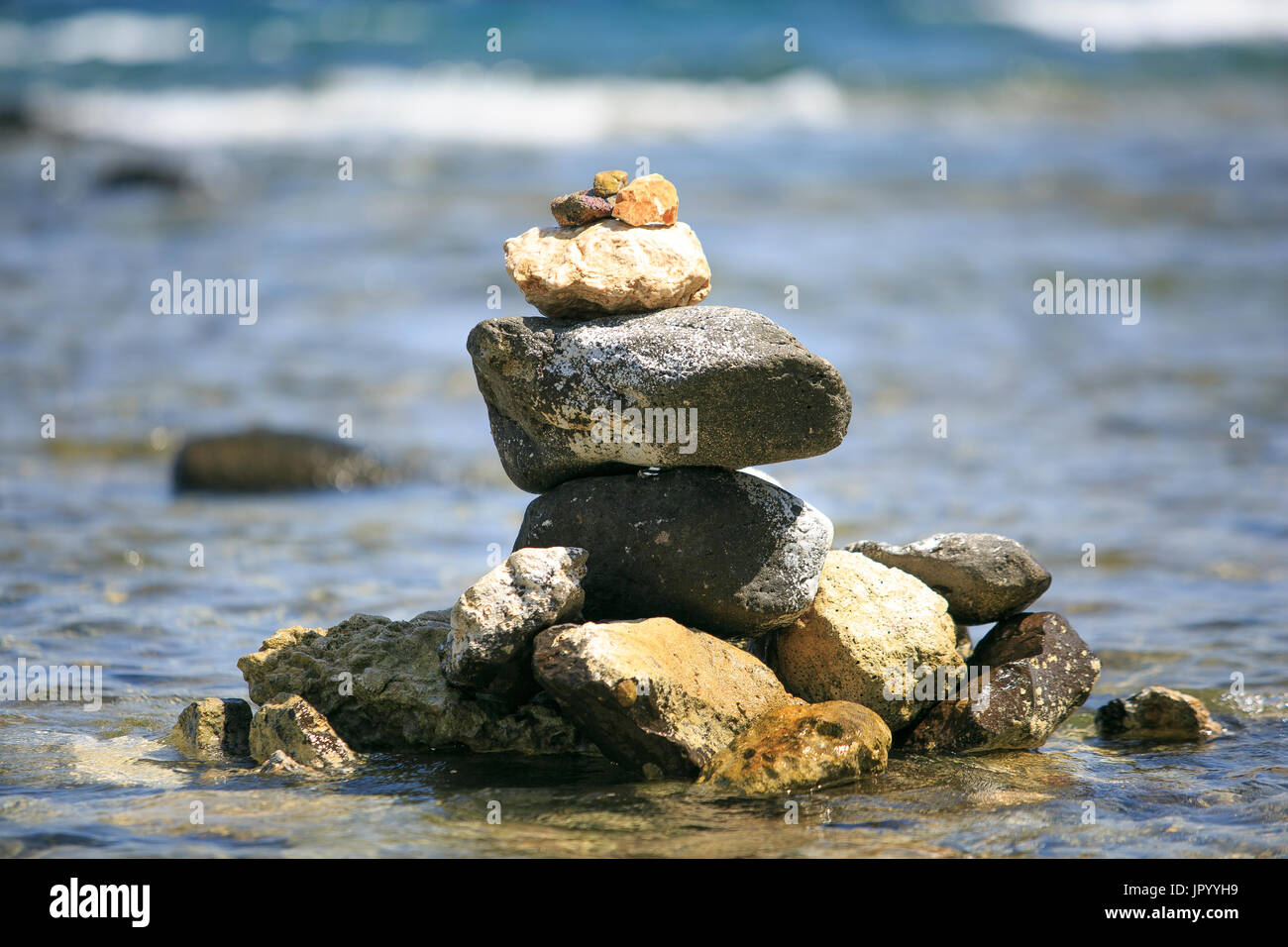 Rounded Stones on the beach Stock Photo - Alamy