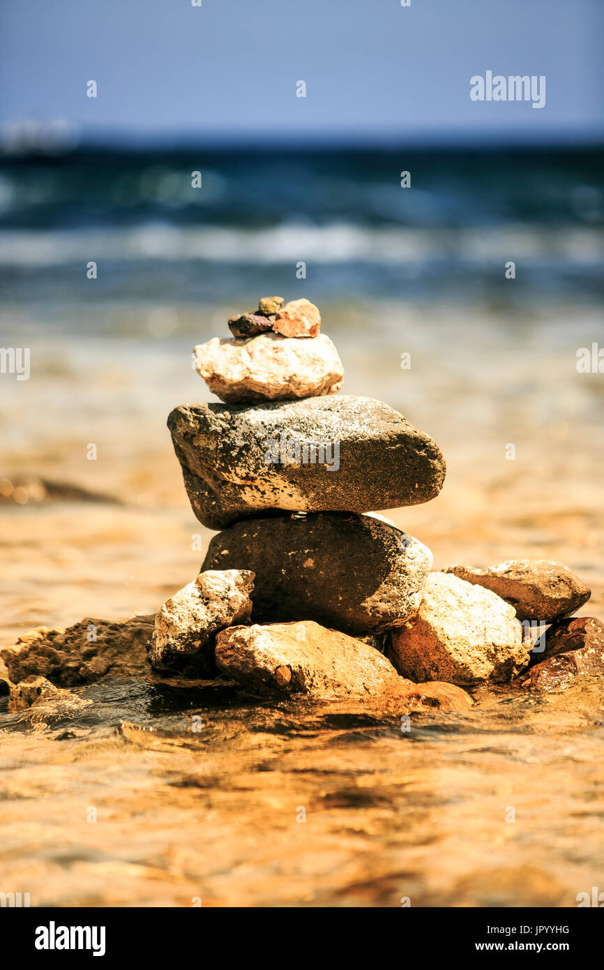 Rounded Stones on the beach Stock Photo - Alamy