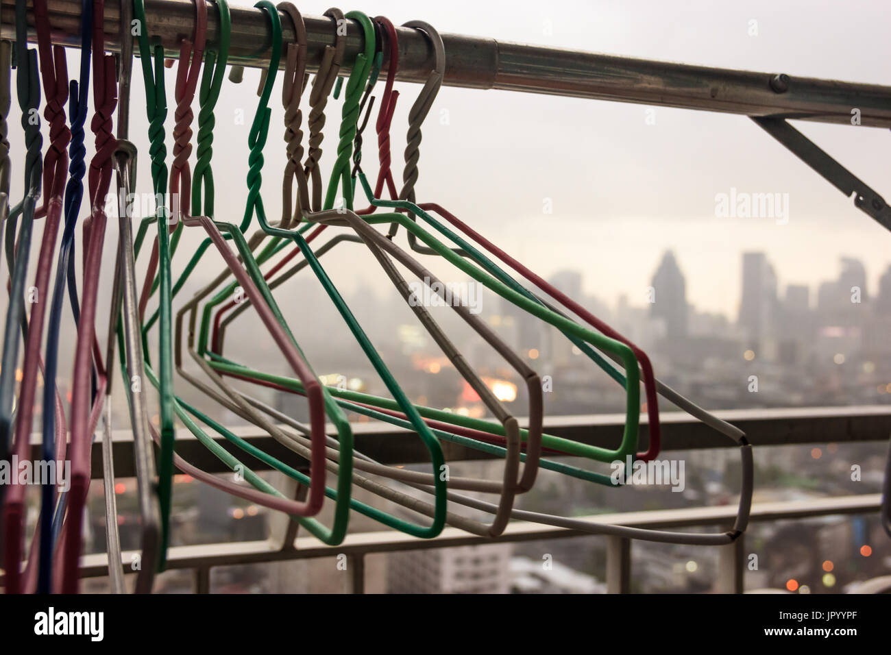 Cloth hangers on Cloth Line at the balcony of residential building in a ...