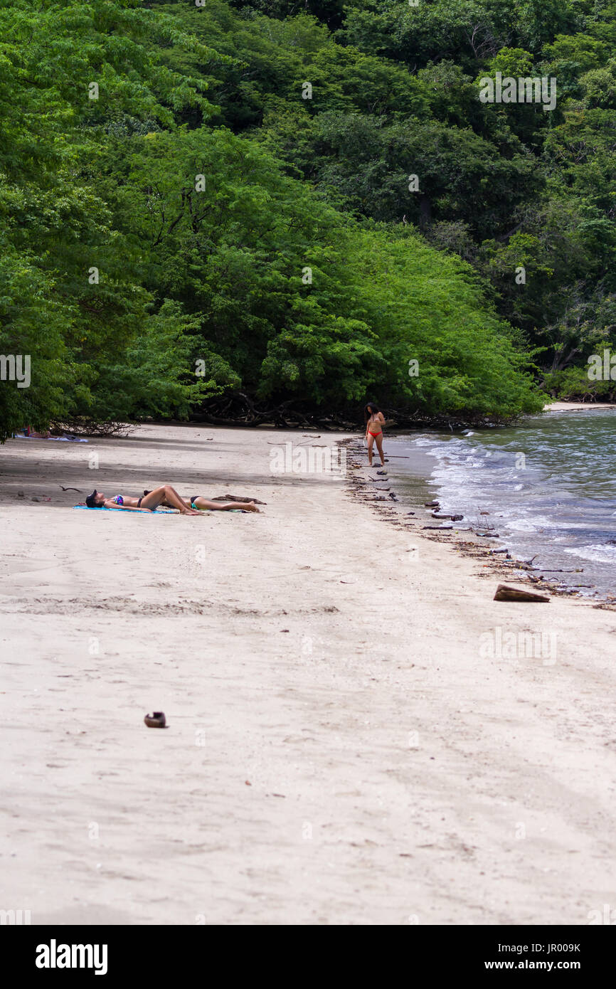 Guanacaste, Costa Rica- July 25: Beautiful young women enjoying the sun ...