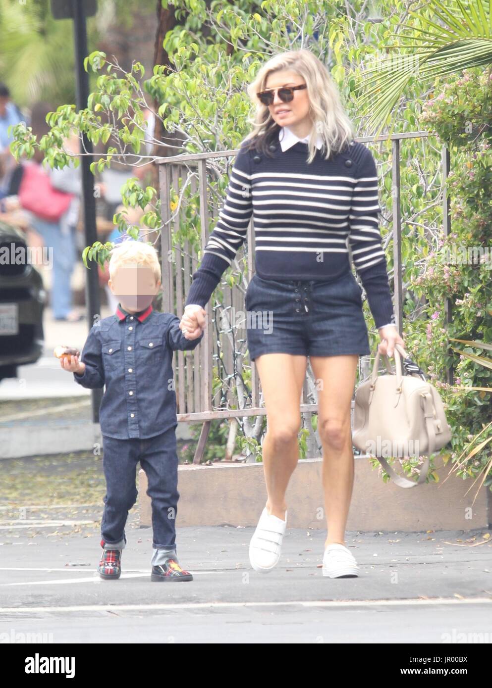 American singer Fergie spotted taking her son to church in Brentwood ...