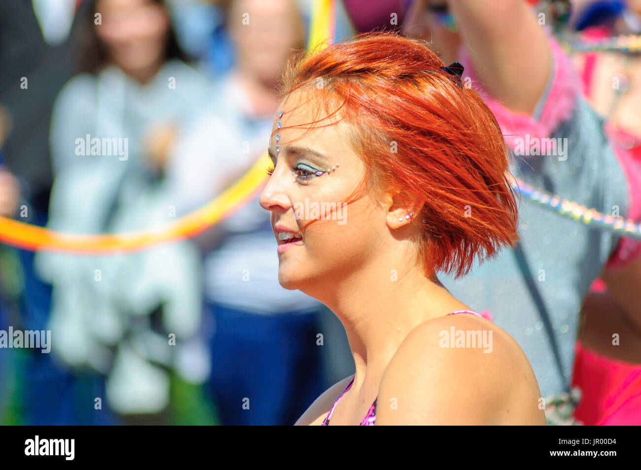 Female Performer in the parade travelling through the streets of ...